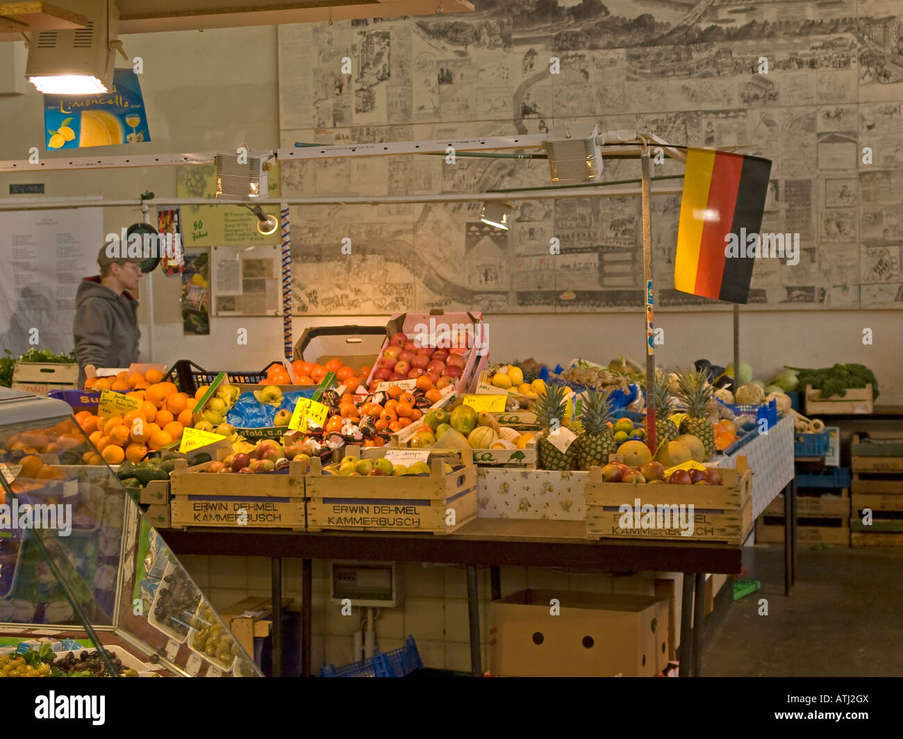 fruits and vegetables for sale in a market stall with German flag in ...