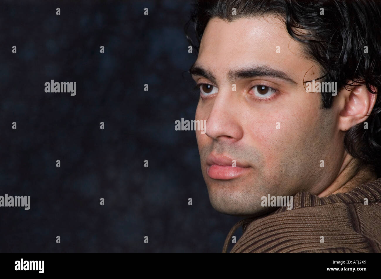 Arabic man face looking away Stock Photo - Alamy