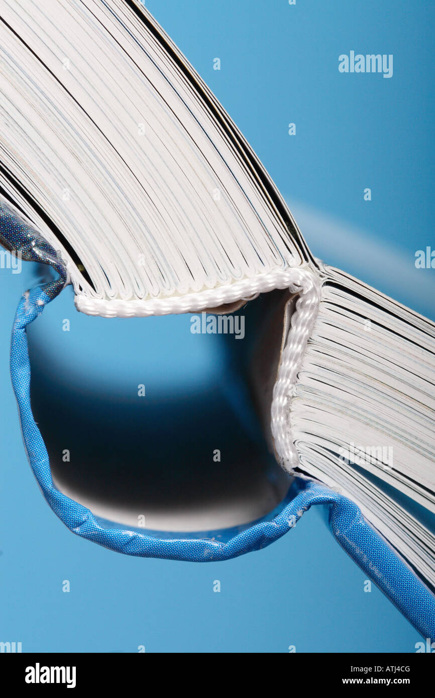 Stitch bound hardback book spine and pages Stock Photo - Alamy