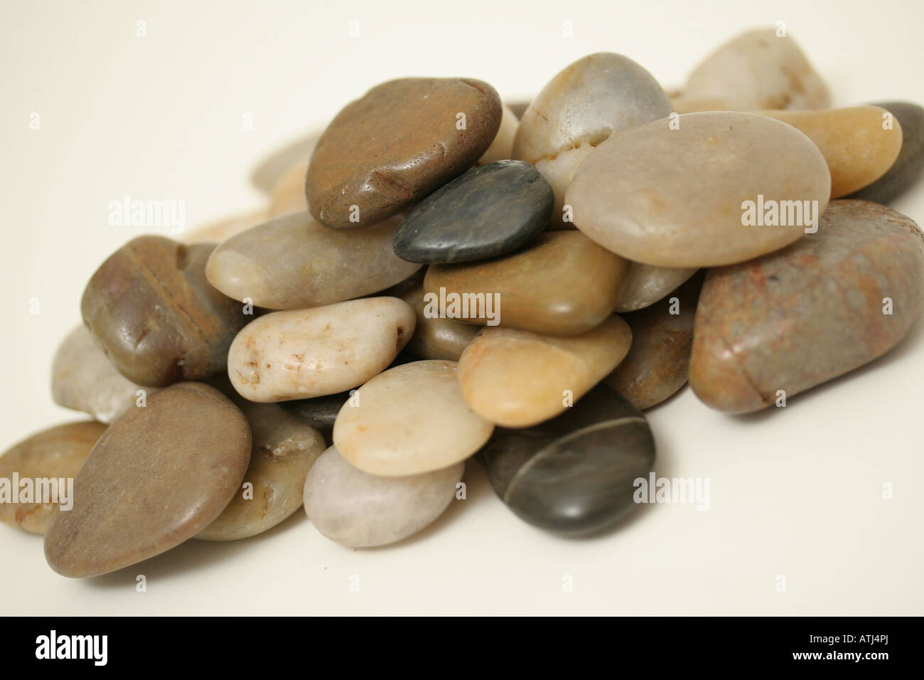 Pile of pebbles close up Stock Photo - Alamy
