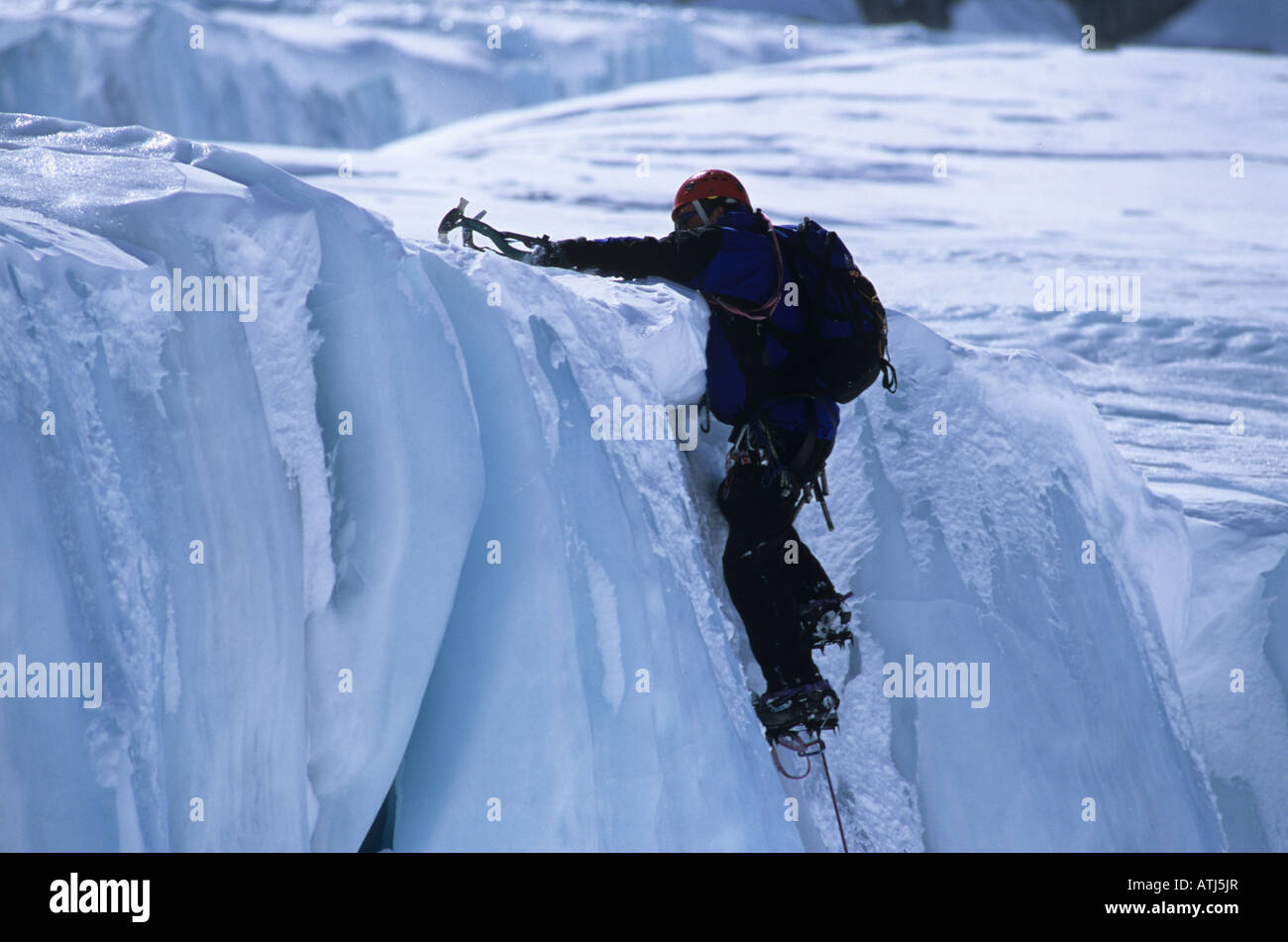 Ice climbing on glacier Stock Photo - Alamy