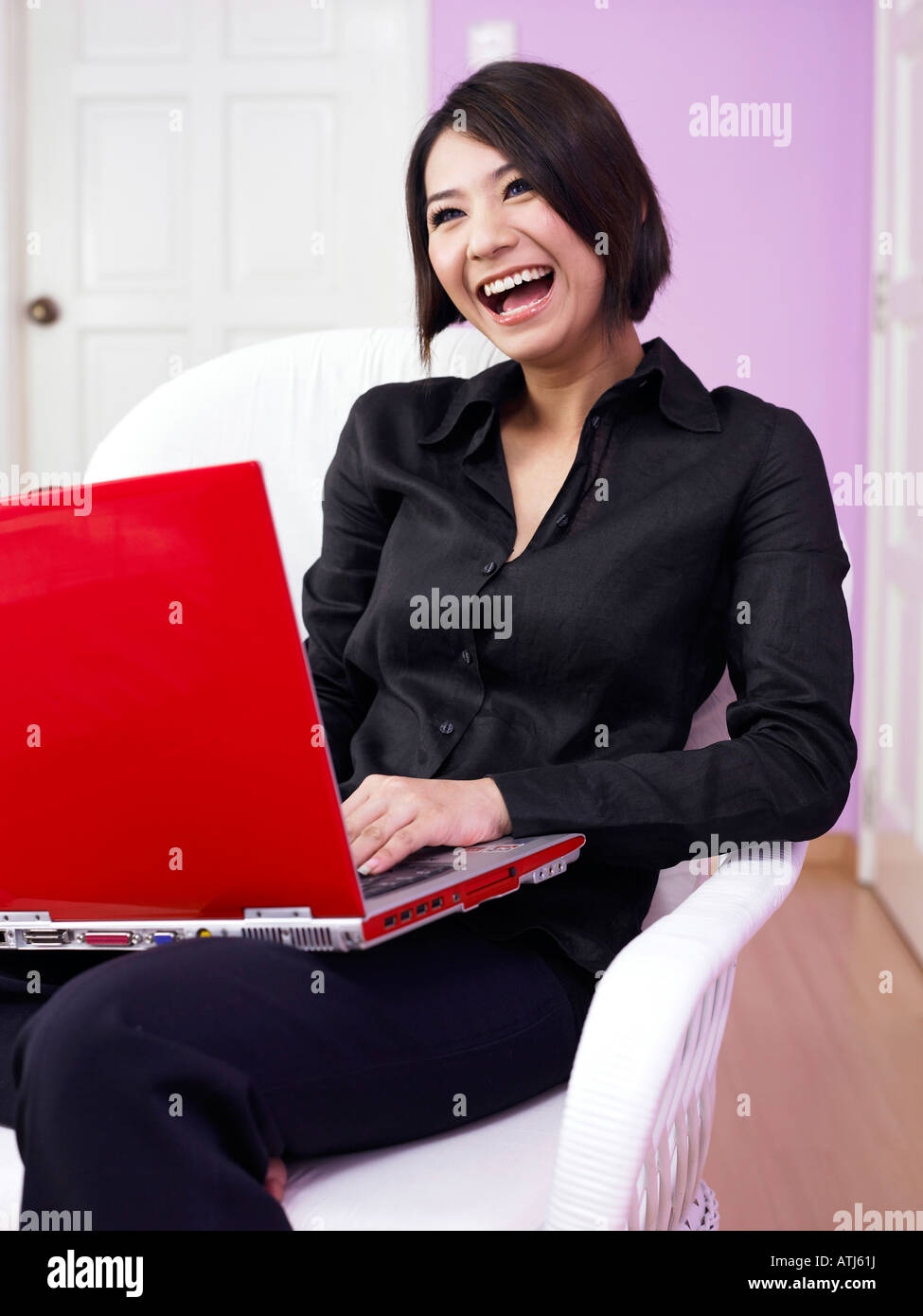 businesswomen with laptop, excited Stock Photo - Alamy