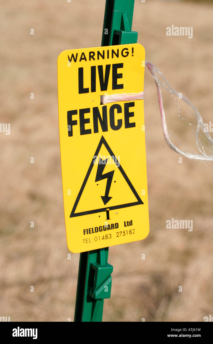 Yellow sign indicating danger electrified hi-res stock photography and ...