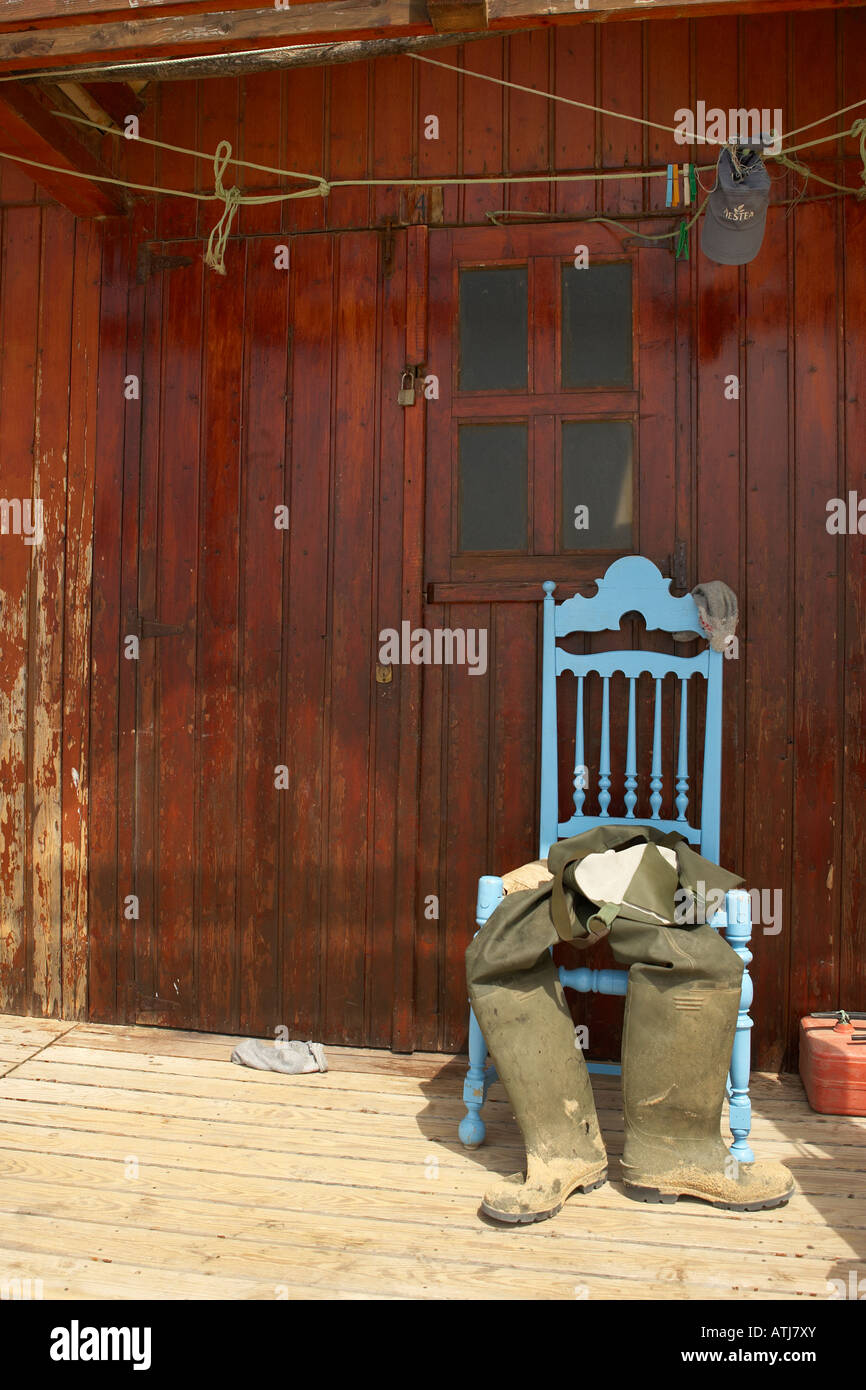 Chair and boots Stock Photo - Alamy