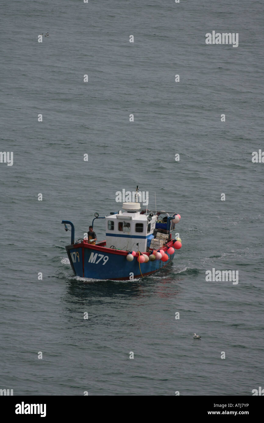 Fishing boat off the Welsh coast Stock Photo - Alamy