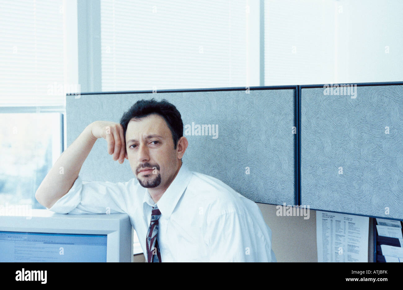 Man Bored In Cubicle