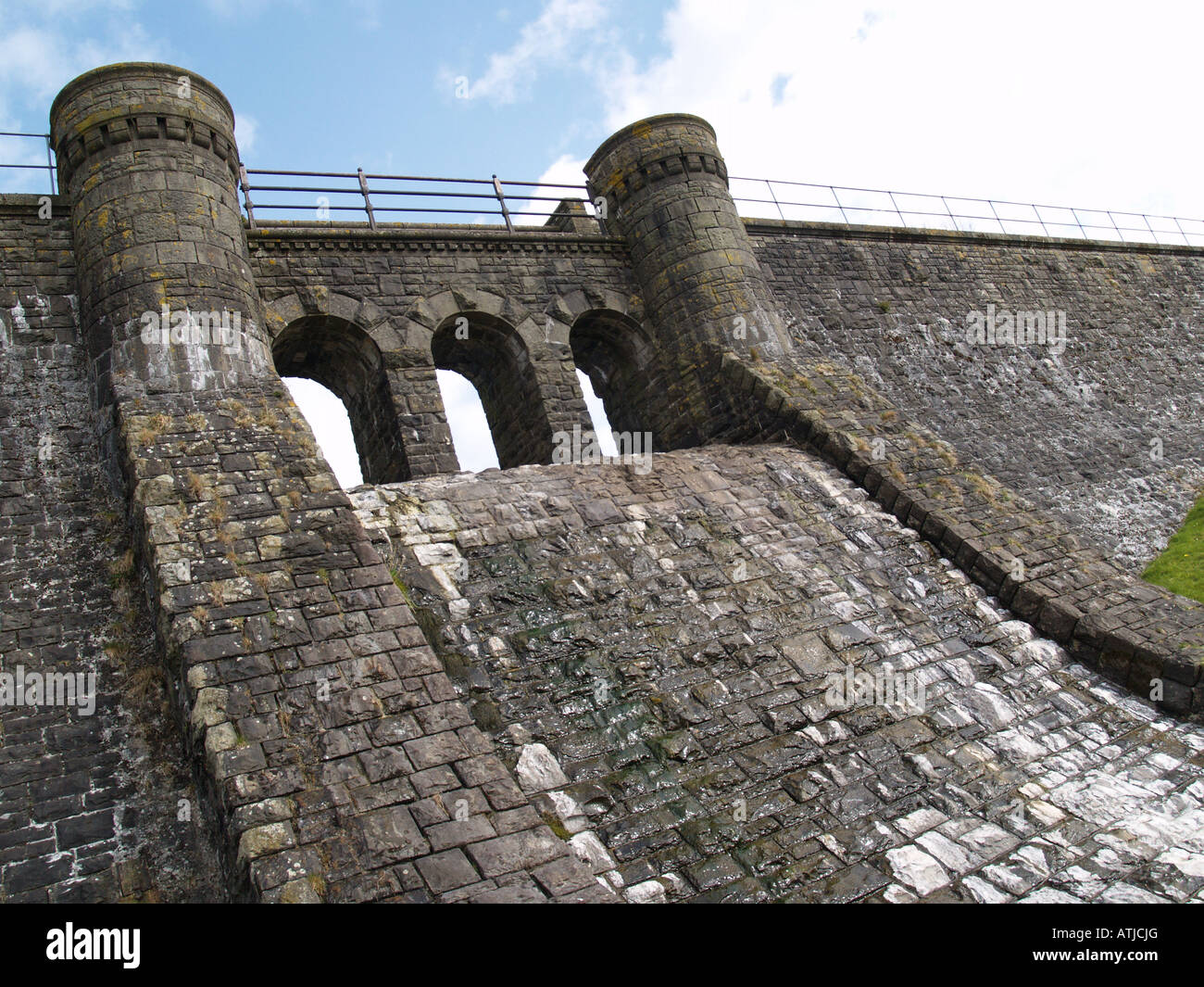tarn victorian reservoir dam wall sluice arches Stock Photo - Alamy