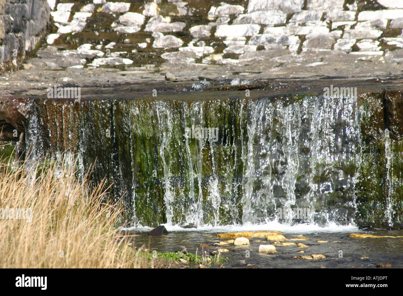 mini waterfall stream rocks reservoir overflow Stock Photo - Alamy