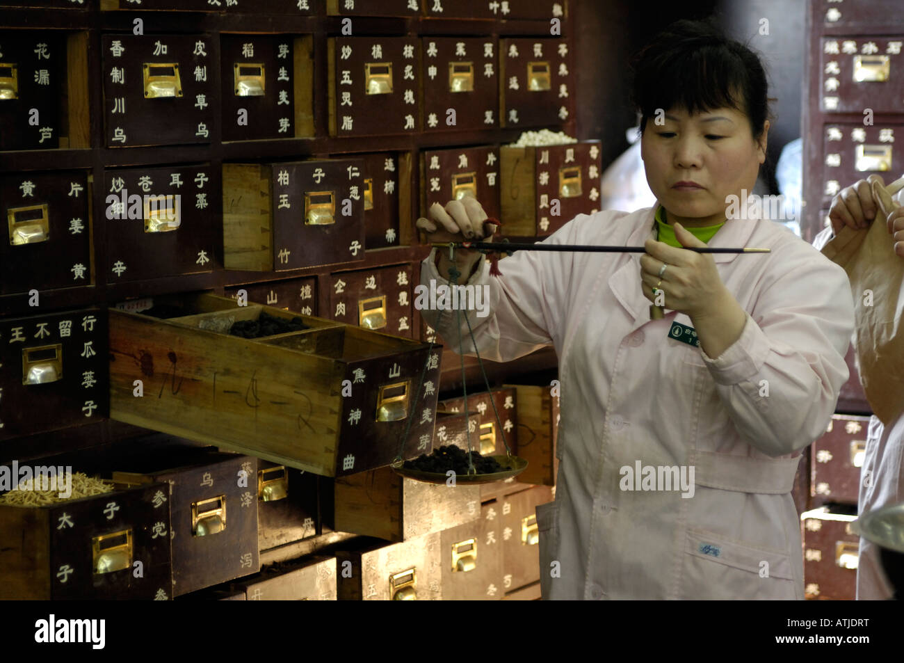 Chinese scale weighing hi-res stock photography and images - Alamy