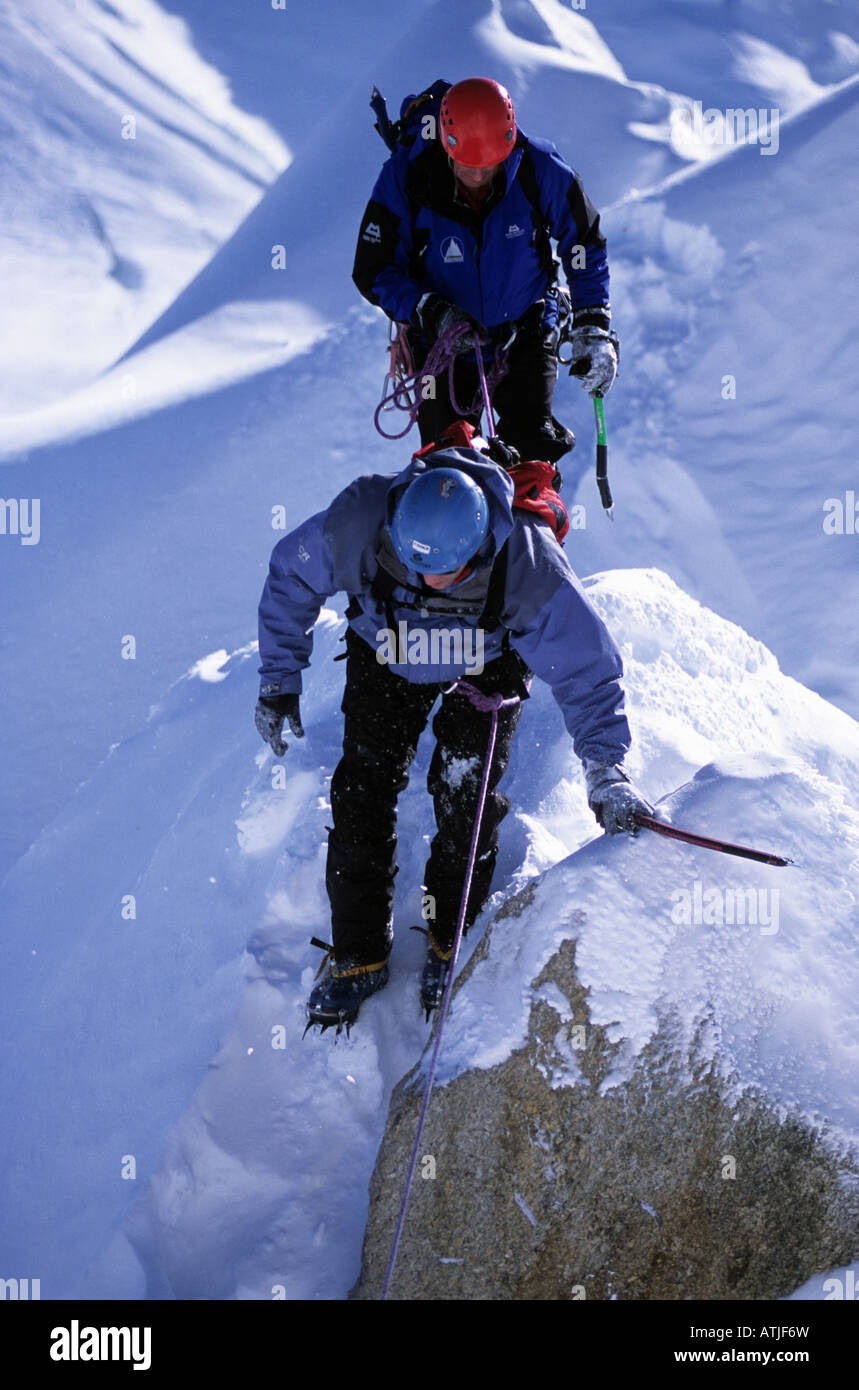 Russell Brice - mountain guide - with client on mountain ridge Stock ...