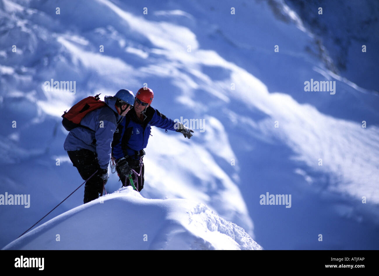 Russell Brice - mountain guide - with client pointing out a feature on ...
