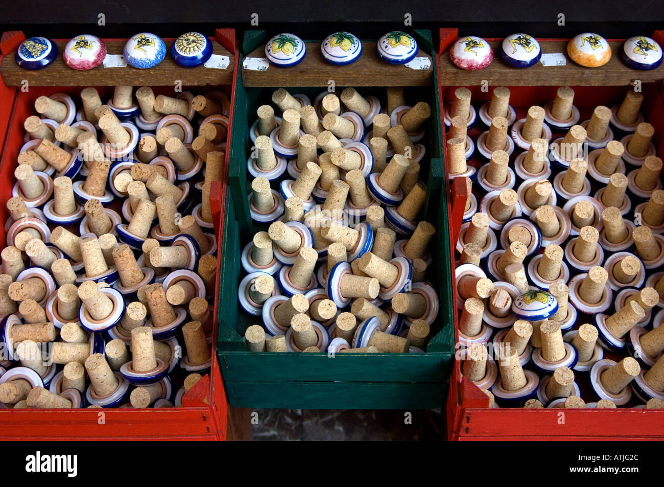 Boxes of colourful ceramic-topped bottle corks on sale in the popular ...