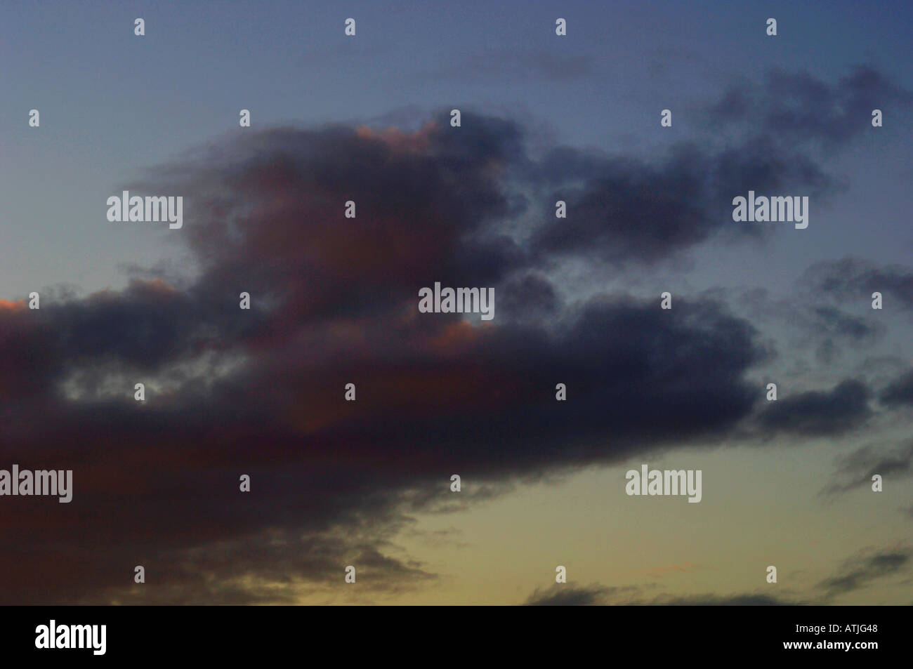 Dark Clouds In An Evening Sky Stock Photo - Alamy