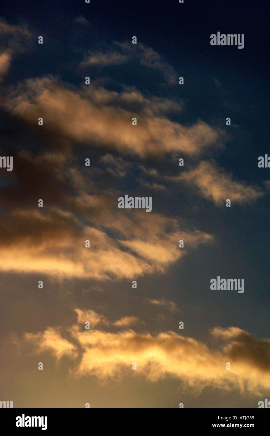 Evening Sky & Warm Coloured Clouds Stock Photo - Alamy