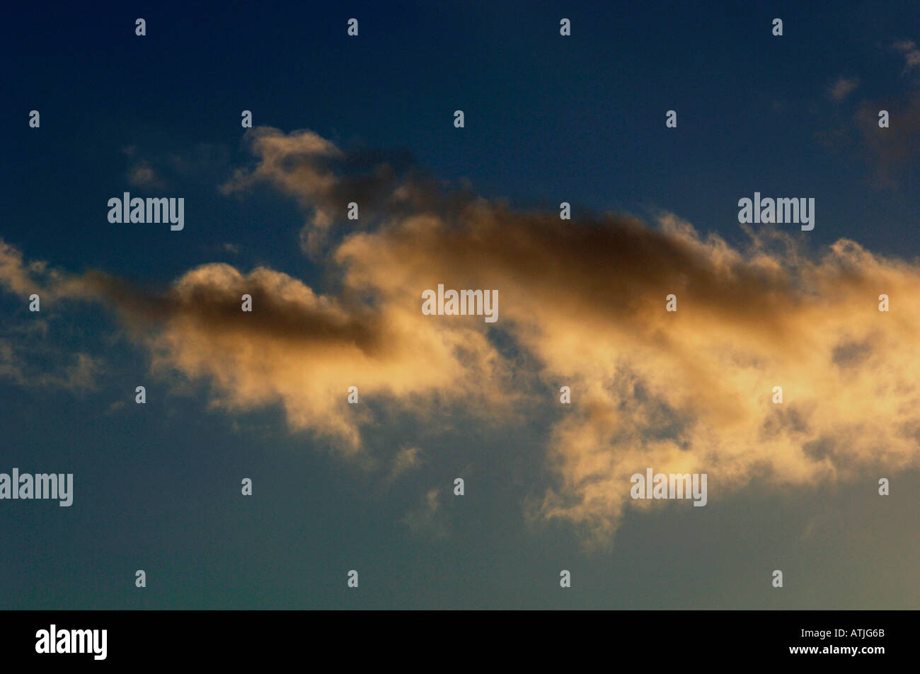 Evening Sky & Warm Coloured Clouds Stock Photo - Alamy