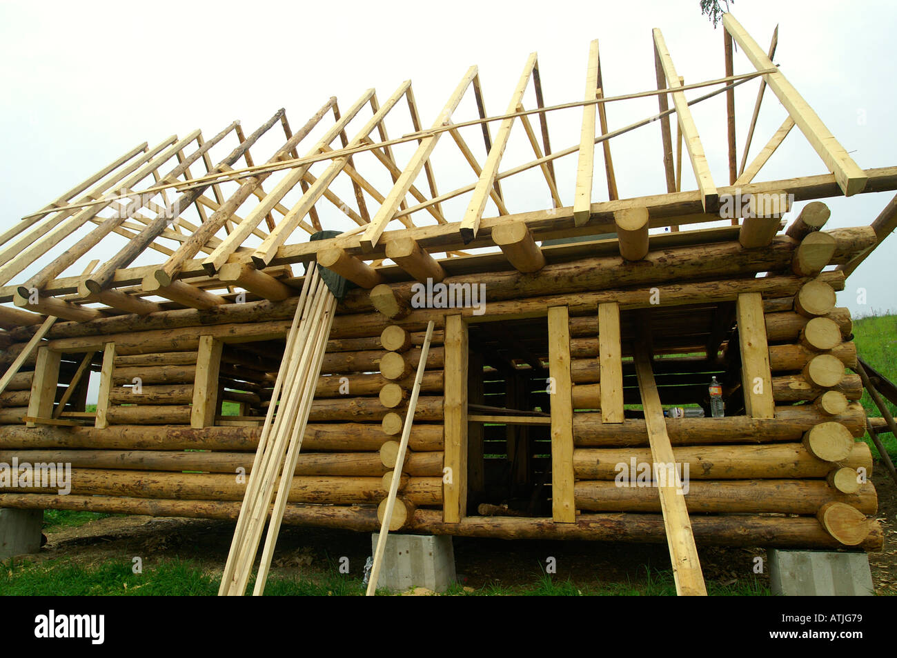 Frame of wooden log house Stock Photo - Alamy