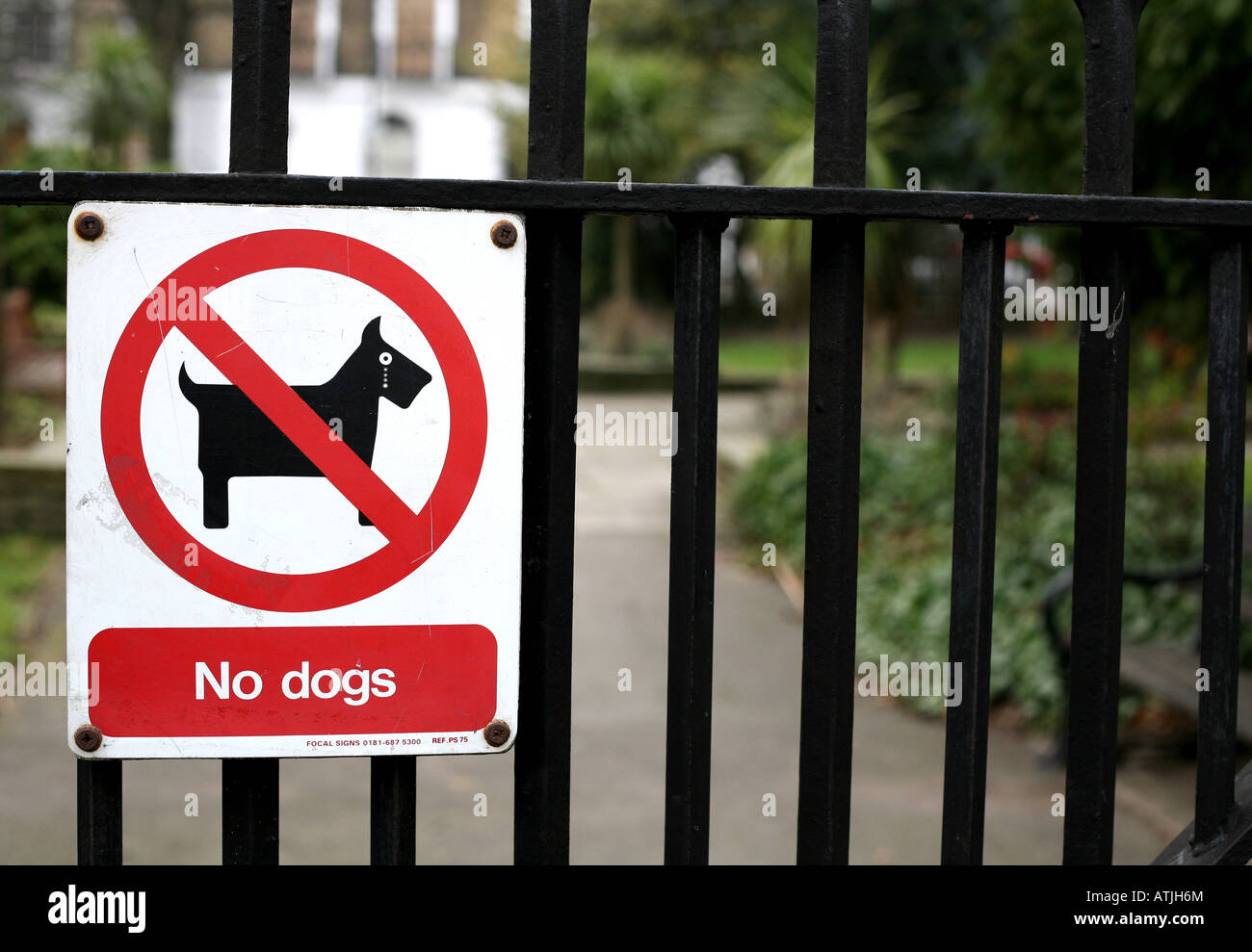 No Dogs sign in London park with added tears Stock Photo - Alamy