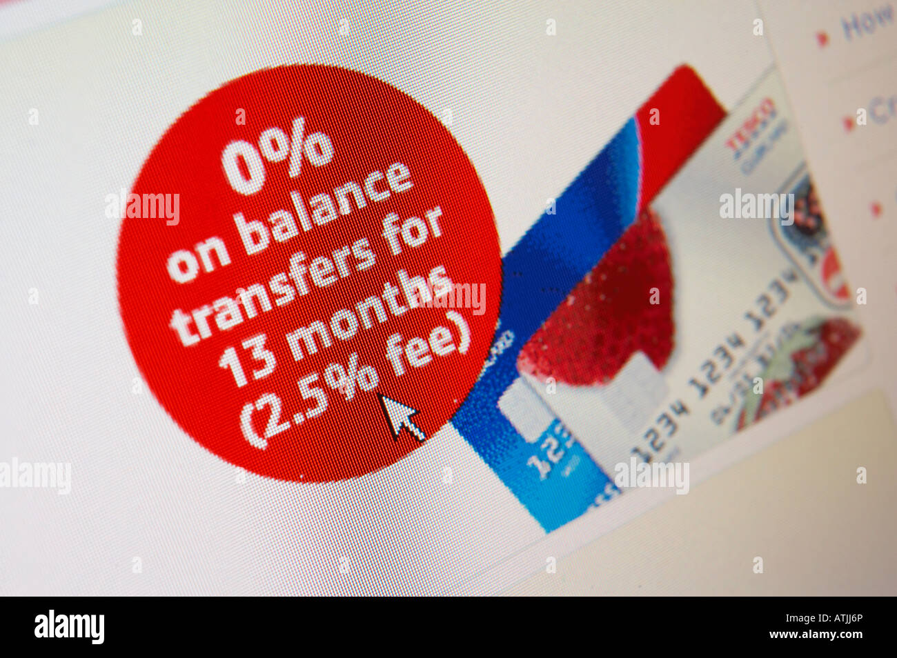 web-site-on-computer-screen-showing-credit-card-balance-transfer-stock
