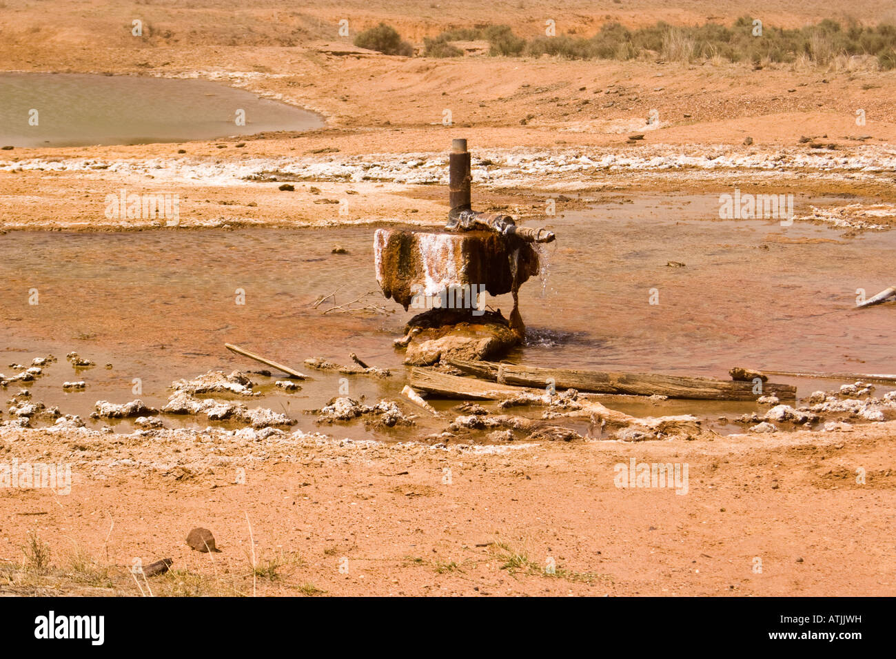 Bore top in a country paddock Stock Photo - Alamy