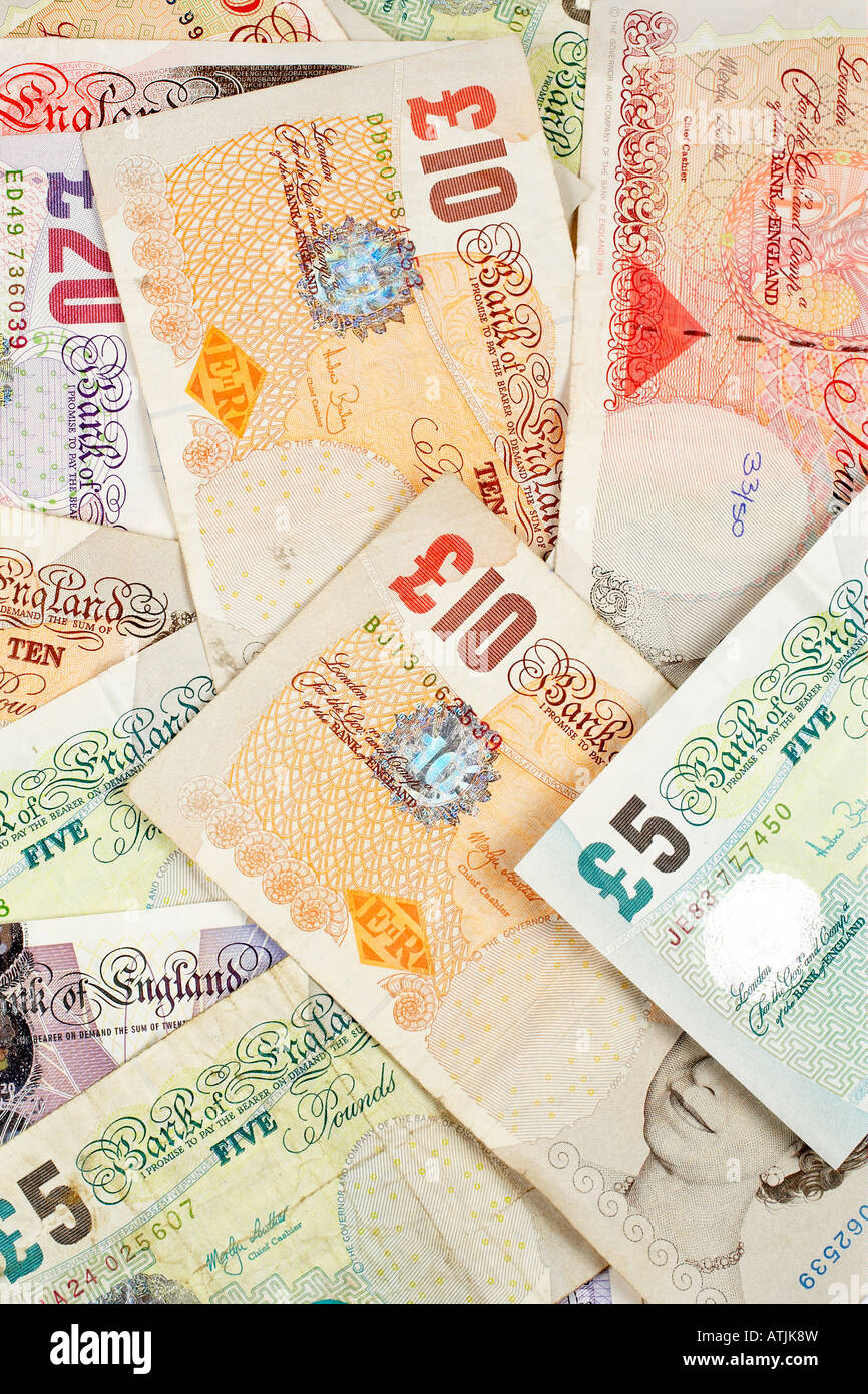 Pounds money background with selective focus at front Stock Photo - Alamy