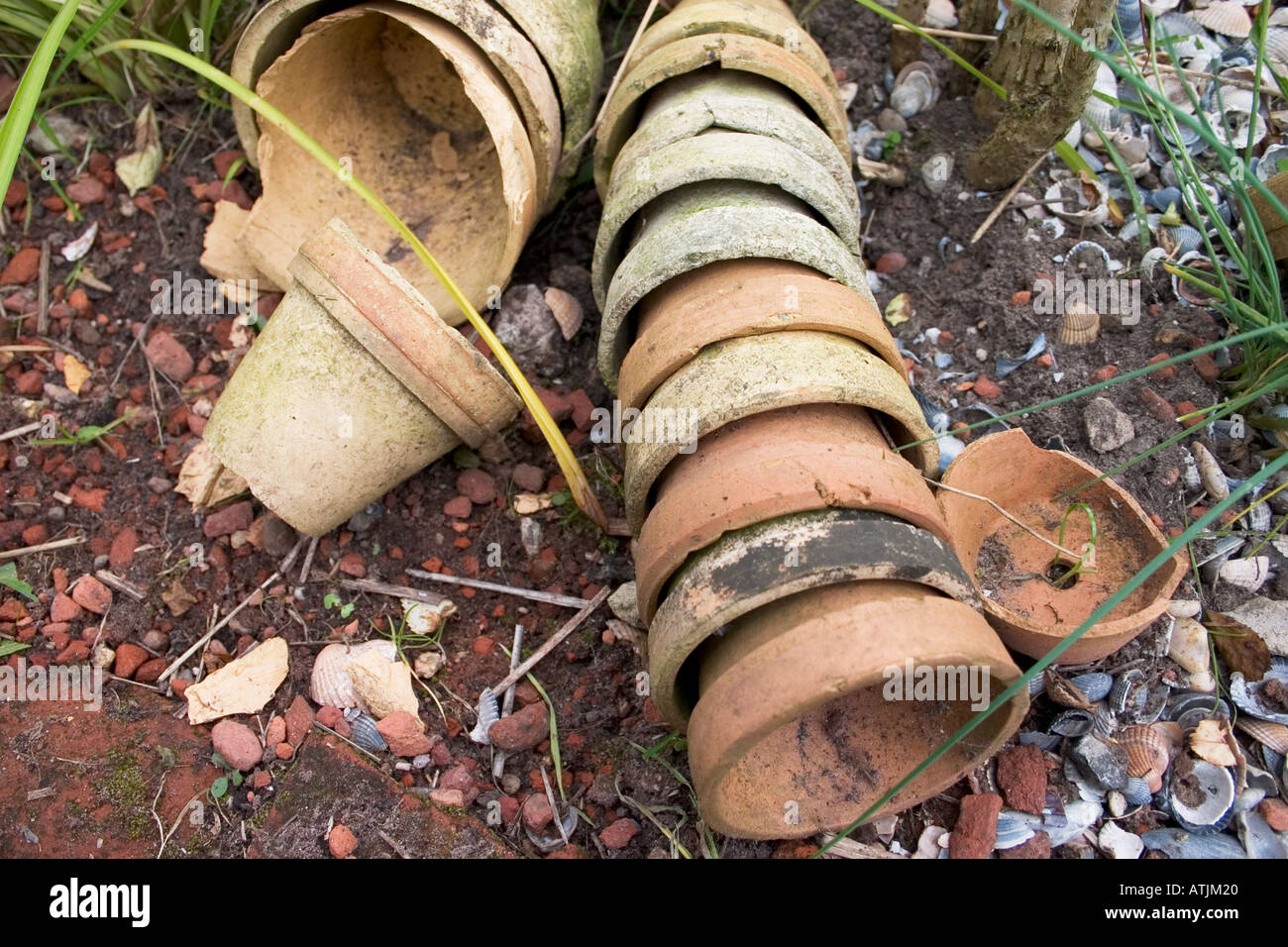 Broken flower pots Stock Photo - Alamy