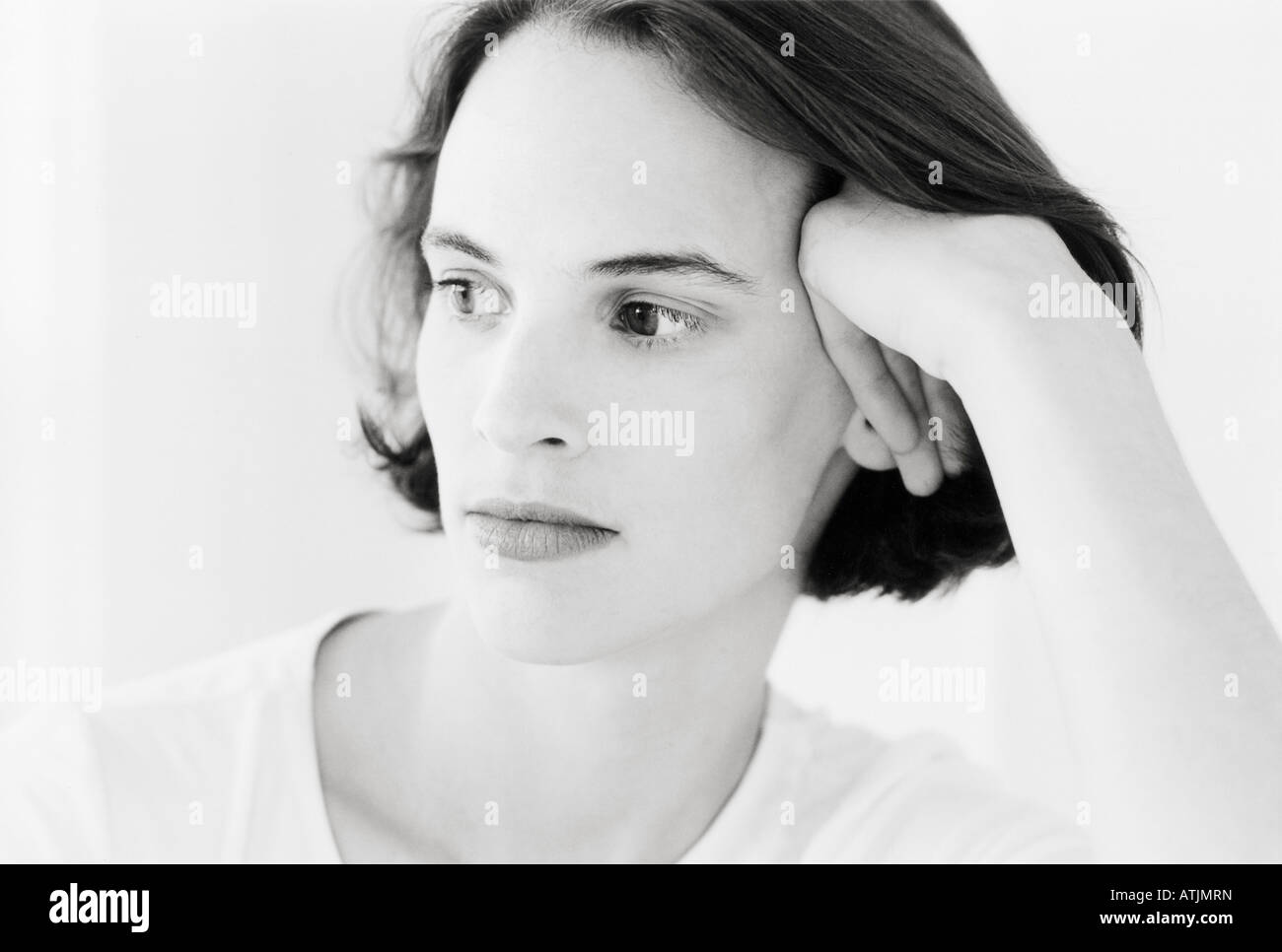 Portrait of an adult female deep in thought Stock Photo - Alamy