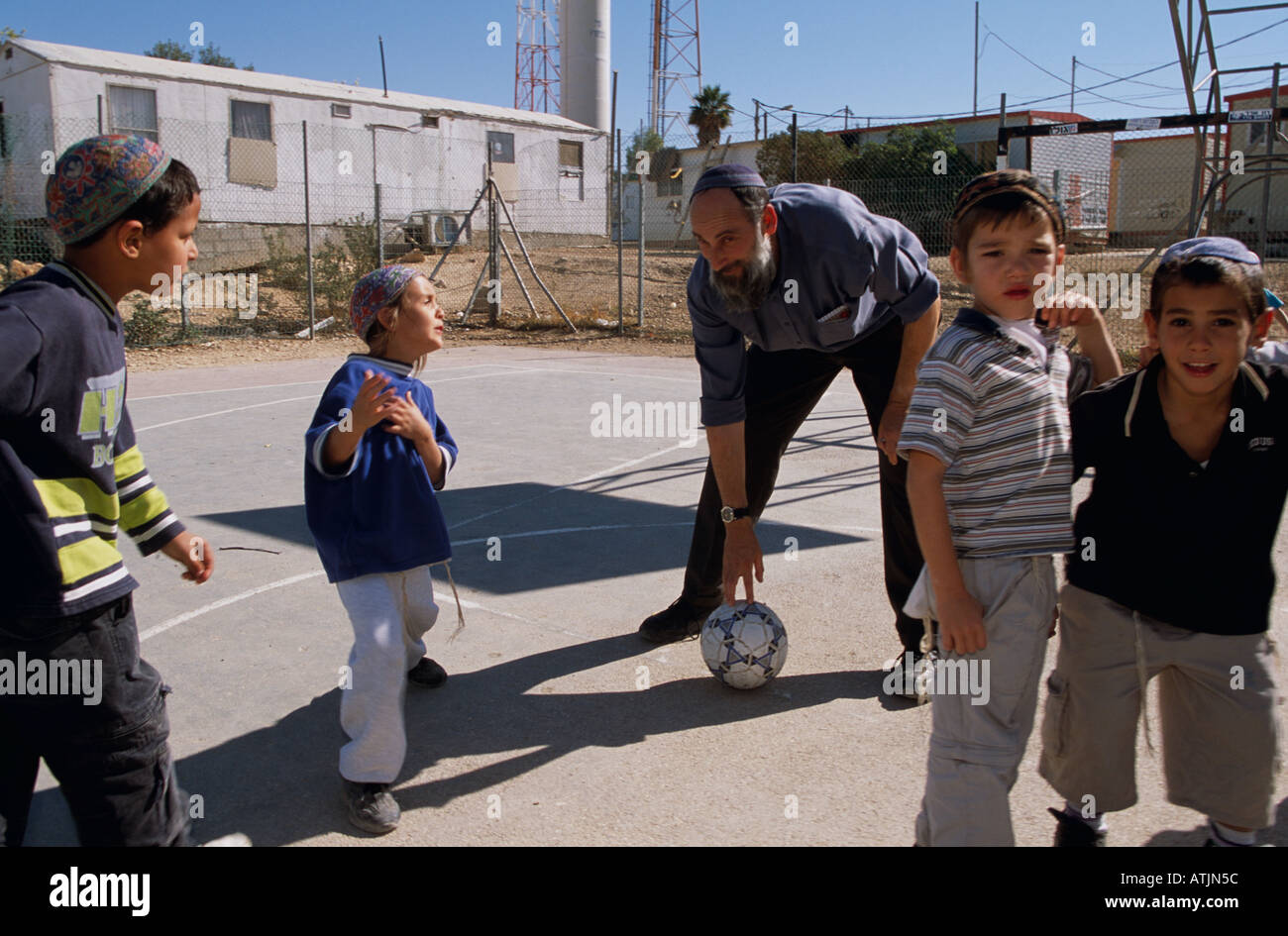 Jewish children learning to play soccer, Jericho, Palestine Stock Photo ...