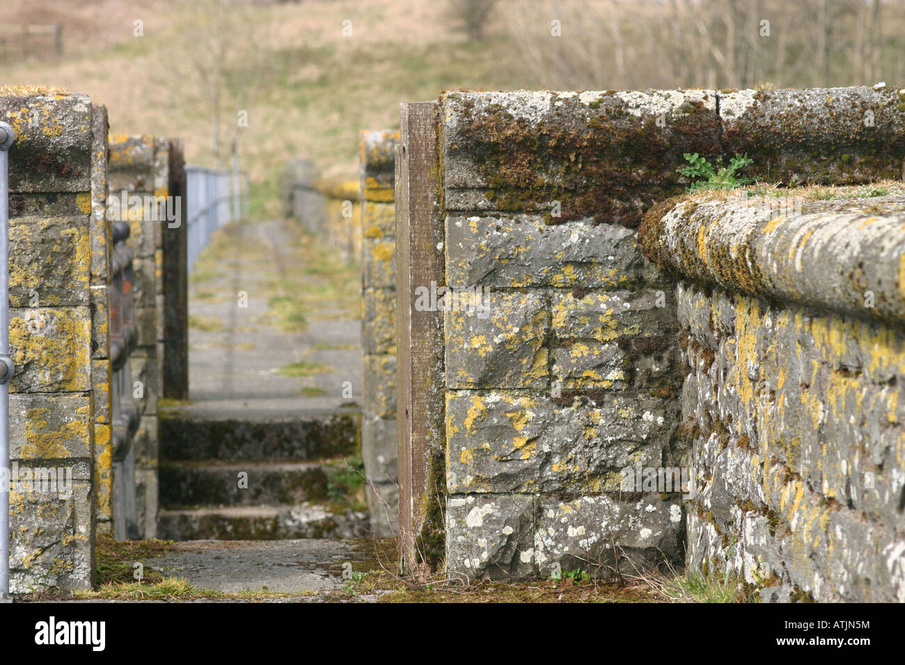 path victorian reservoir dam drystone wall rampart Stock Photo - Alamy