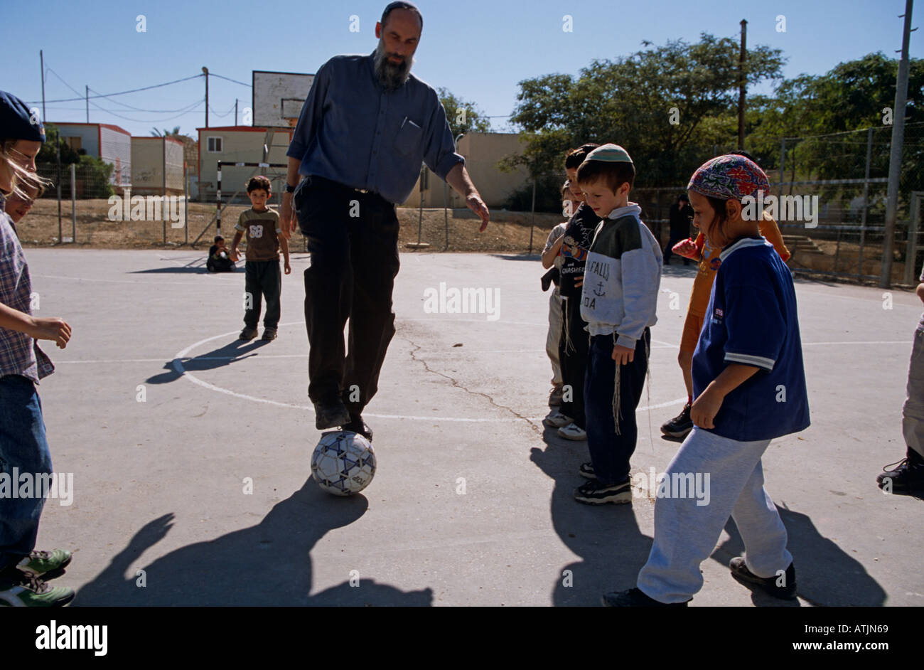 Jewish children learning to play soccer, Jericho, Palestine Stock Photo ...