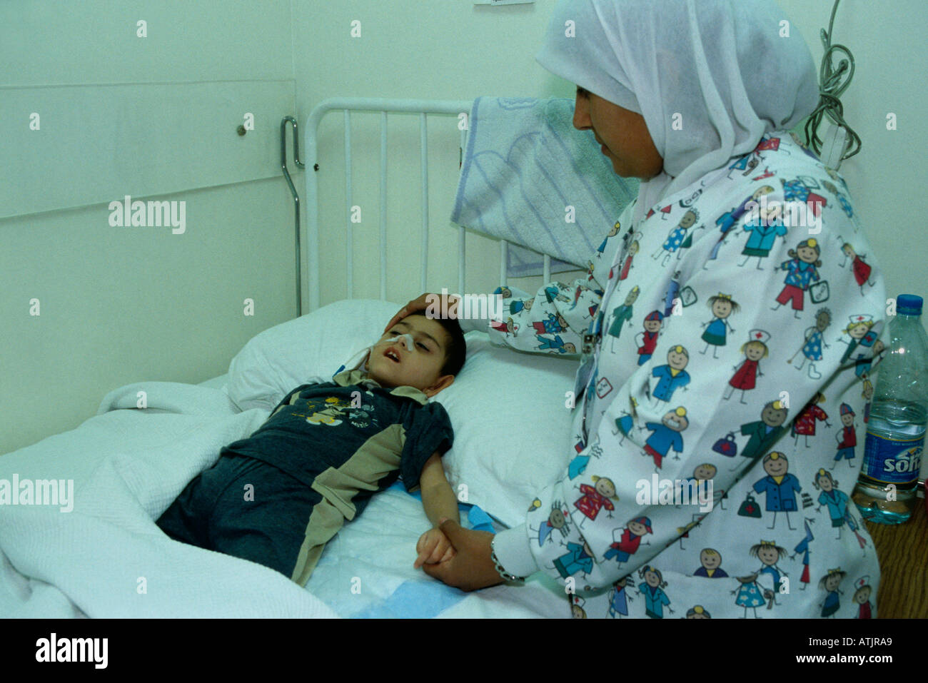 Adult son caring sick woman hi-res stock photography and images - Alamy