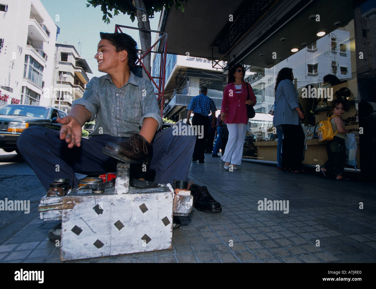 Boy polishing shoes hi-res stock photography and images - Alamy