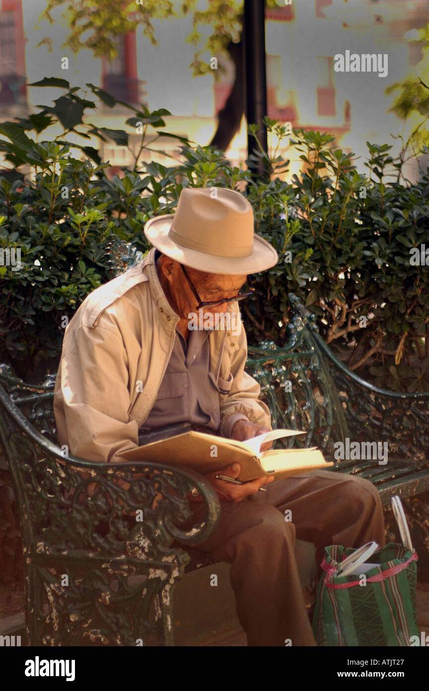 Old Man reading in Owacka Stock Photo - Alamy