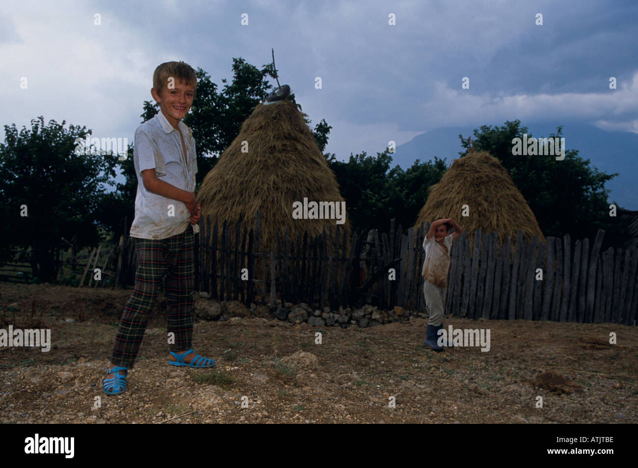 Boys playing in farm, Kukes, Albania Stock Photo - Alamy