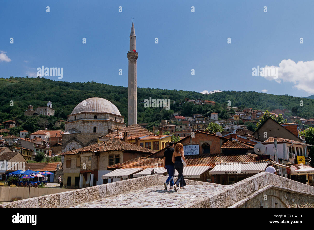 Couple crossing bridge at Albanian village, Kosovo, Albania Stock Photo ...