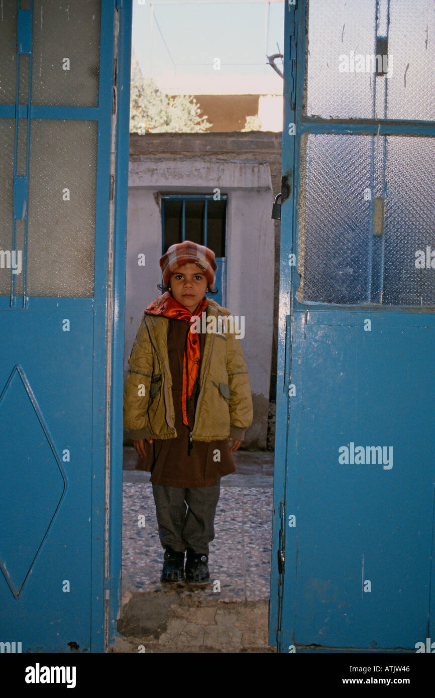 Young Palestinian boy standing outside house, Palestine Stock Photo - Alamy