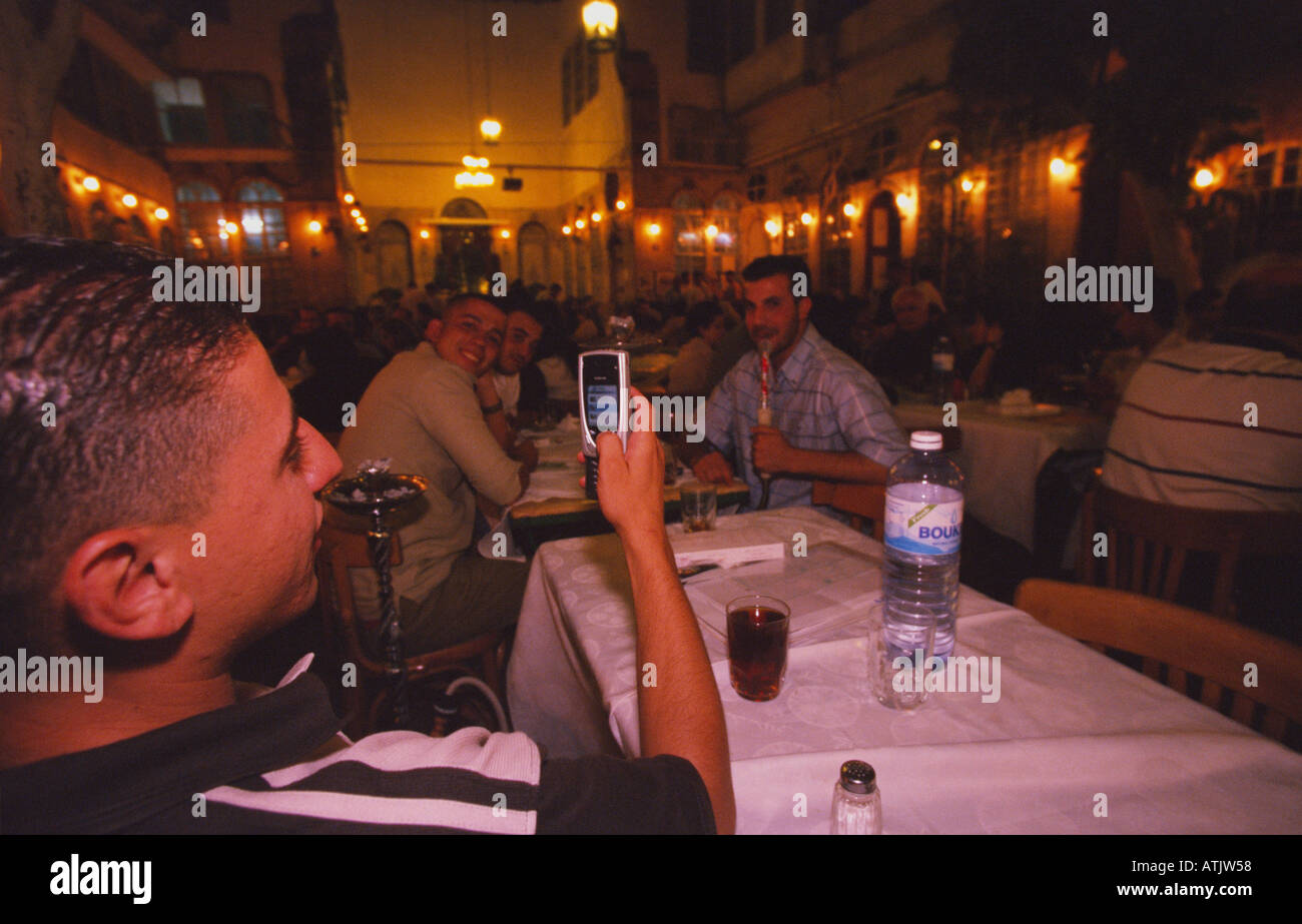 People eating inside restaurants fun hi-res stock photography and ...