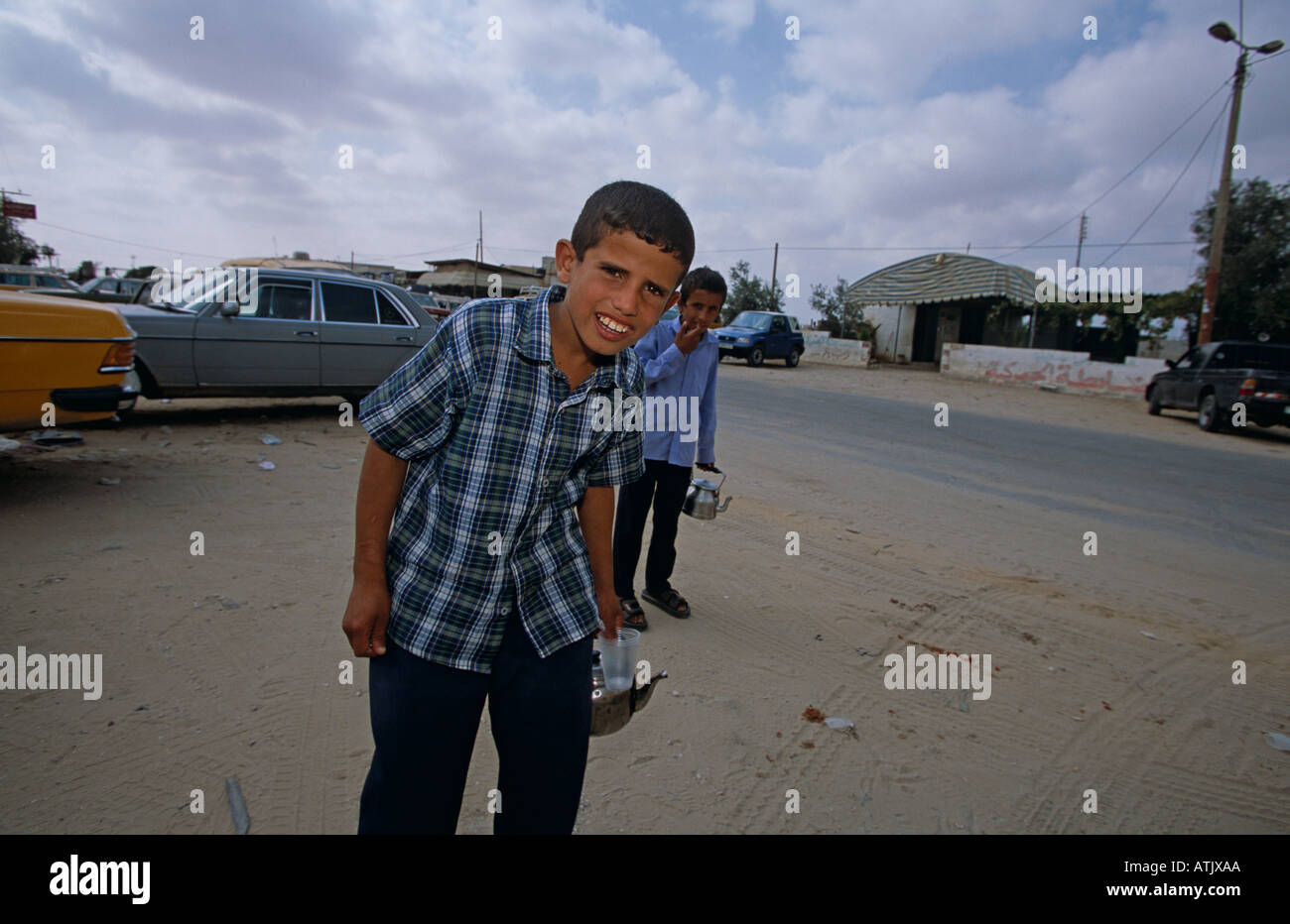 Boys selling tea on roadside, Gaza Strip-Rafah border, Egypt Stock ...