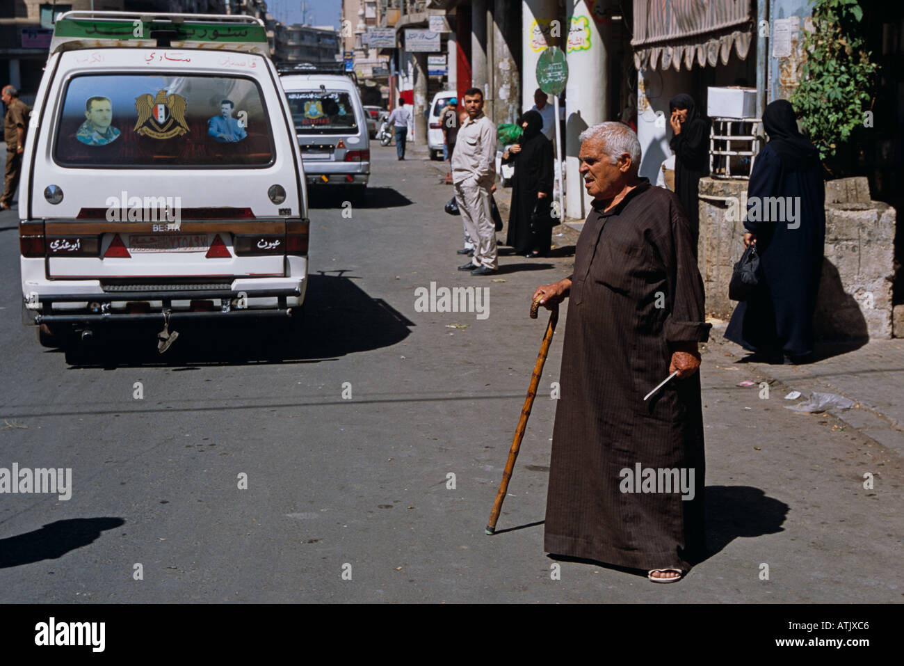 An elderly man crossing the street Stock Photo - Alamy