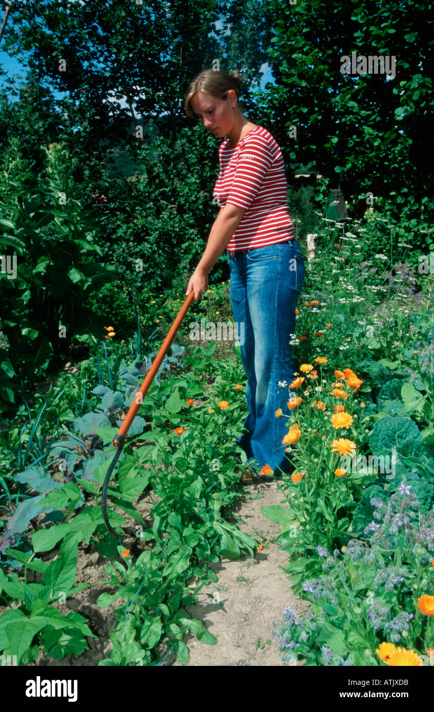 Woman and her garden hi-res stock photography and images - Alamy