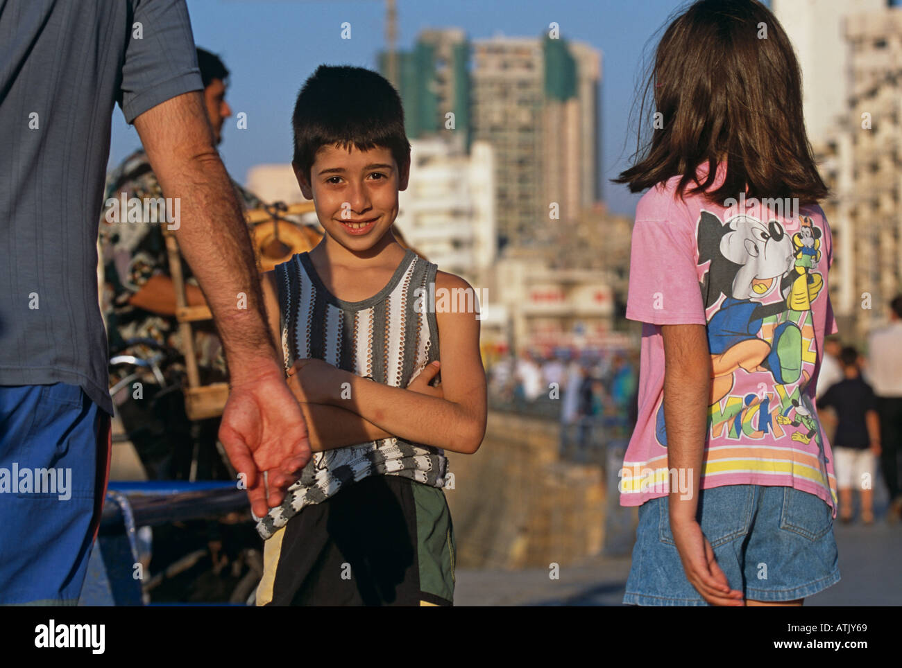 Young boy with family at Corniche promenade, Beirut, Lebanon Stock ...