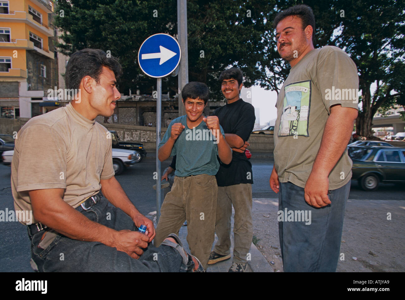 Syrian workers loitering in streets, Beirut, Lebanon Stock Photo - Alamy
