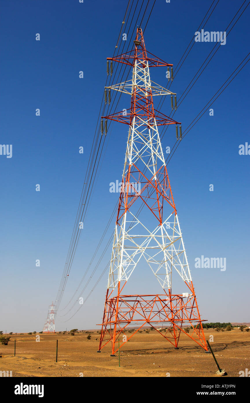 Electricity power transmission line and pylons receding in distance ...
