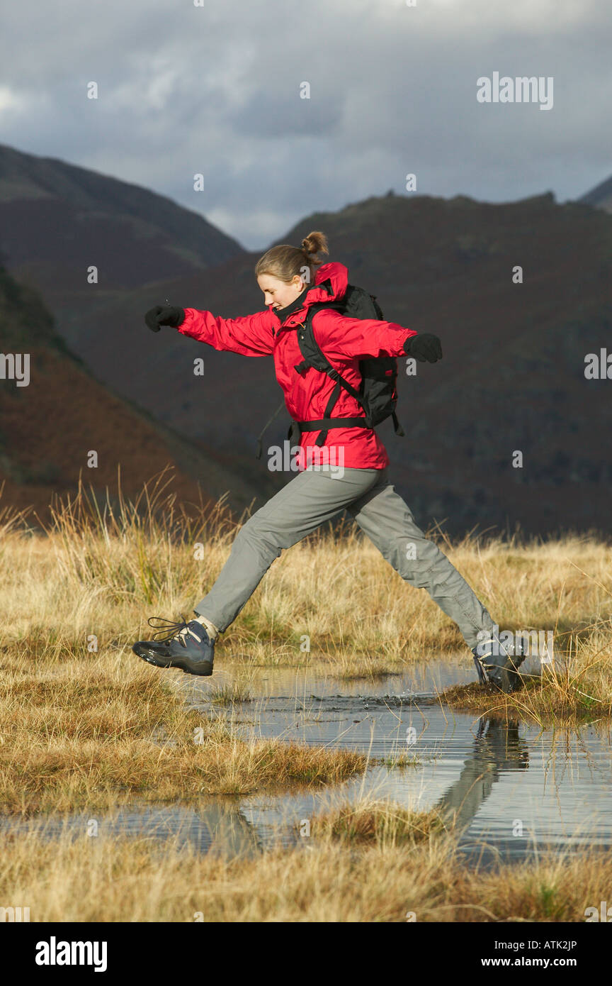 Leaping over puddle hi-res stock photography and images - Alamy