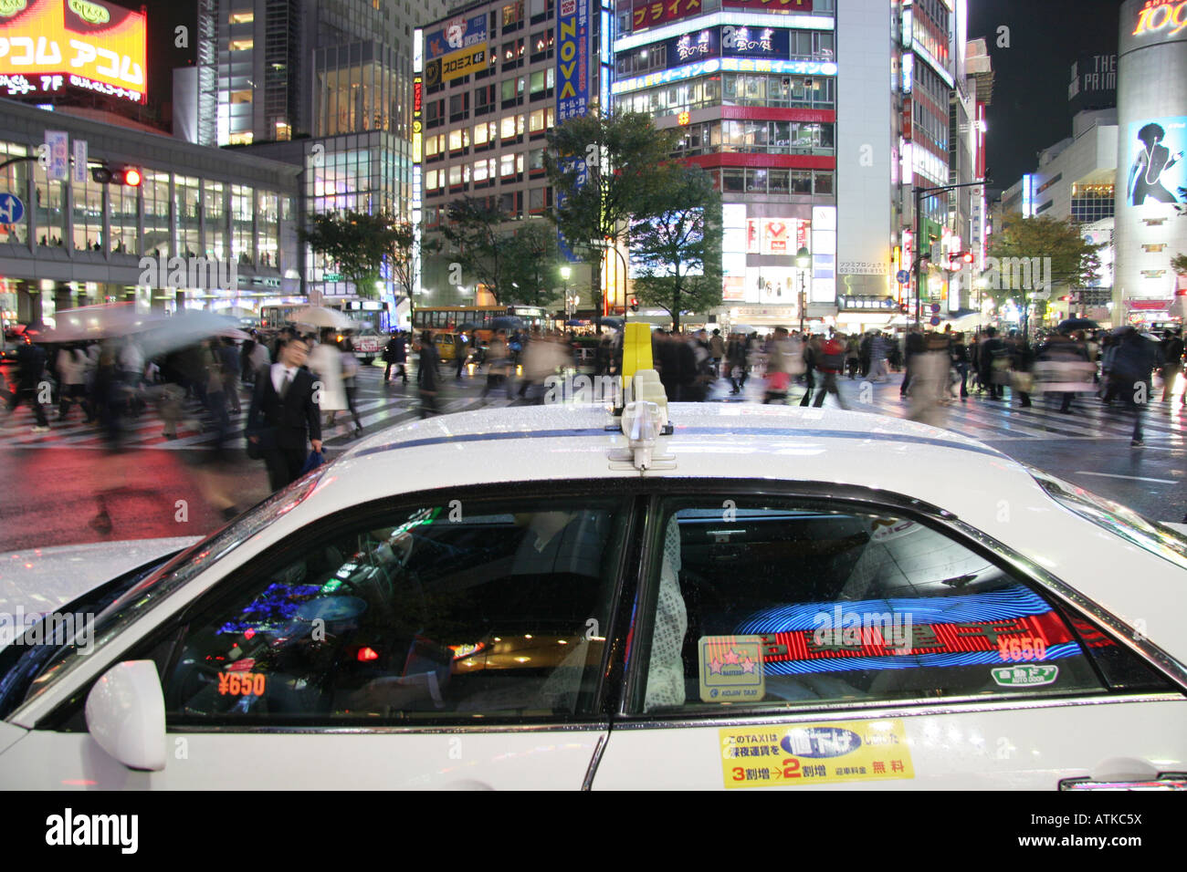 Japan Tokyo Japanese taxi on the crossroad in Shibuya district of Tokyo ...