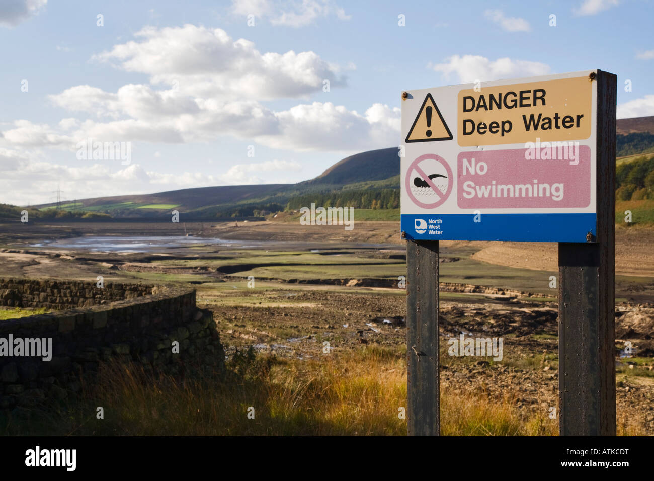 Danger deep water sign by dry Torside reservoir in Peak District ...