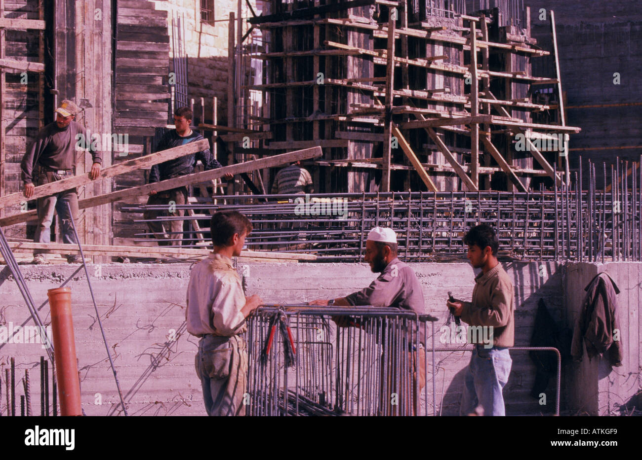 Workers at a construction site in Jerusalem Stock Photo - Alamy