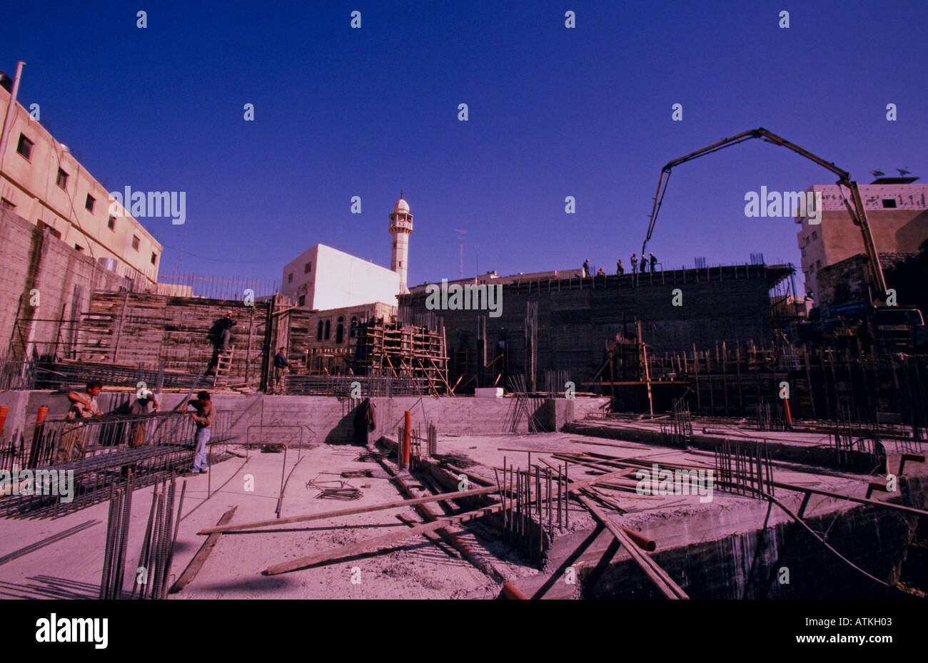 Workers at a construction site in Jerusalem Stock Photo - Alamy