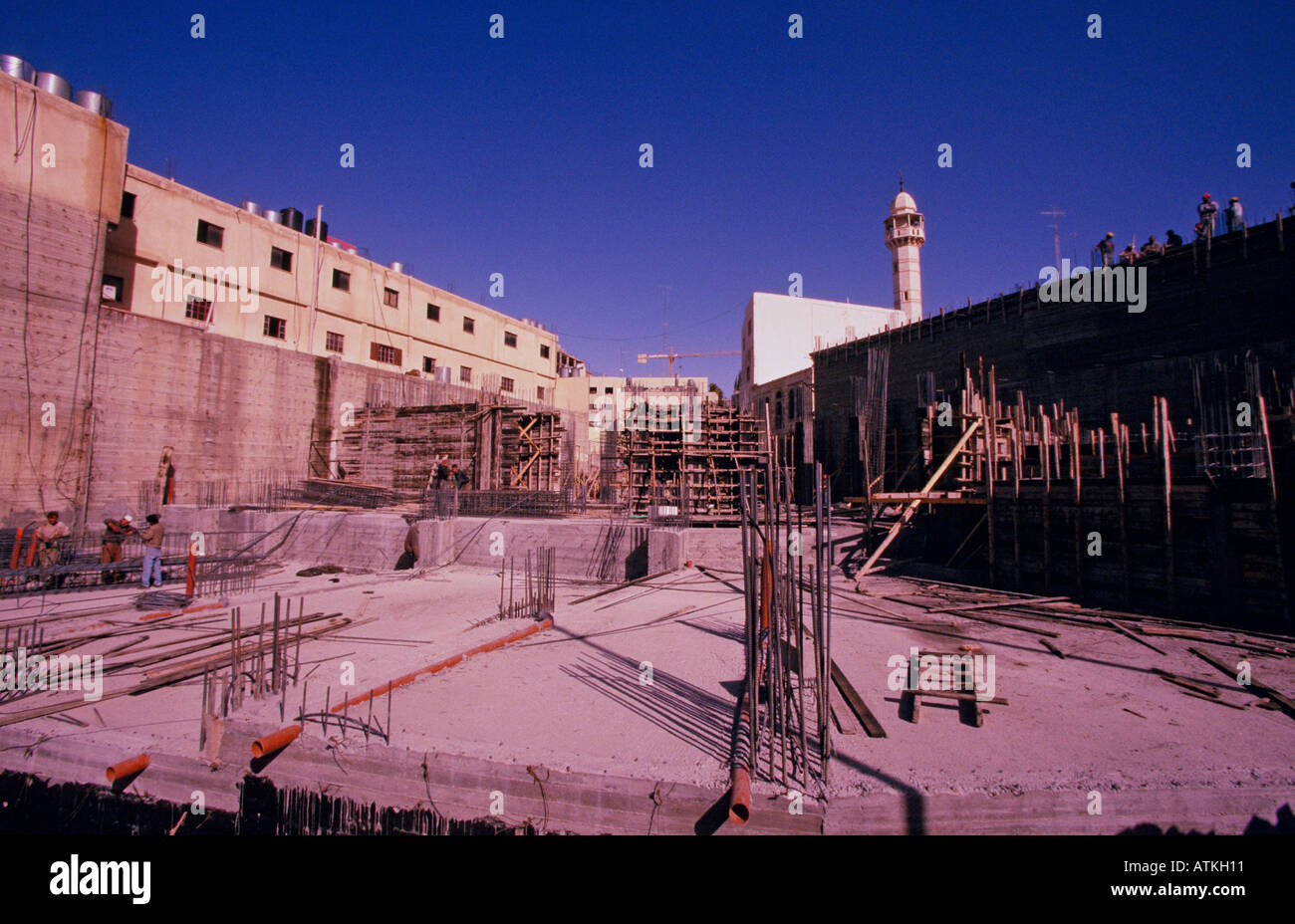 Workers at a construction site in Jerusalem Stock Photo - Alamy