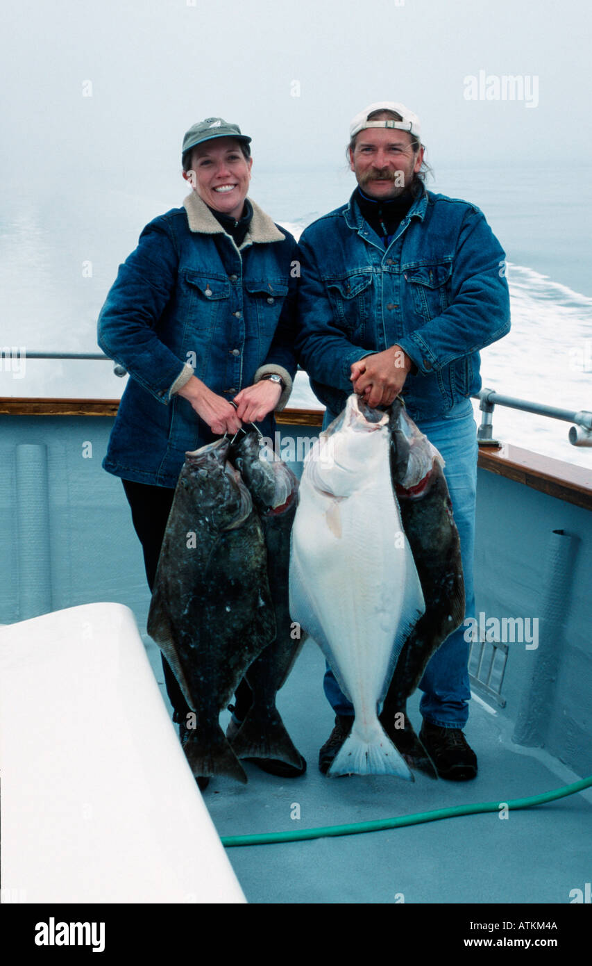 Angler with Atlantic Halibut / Angler mit Heilbutt Stock Photo - Alamy