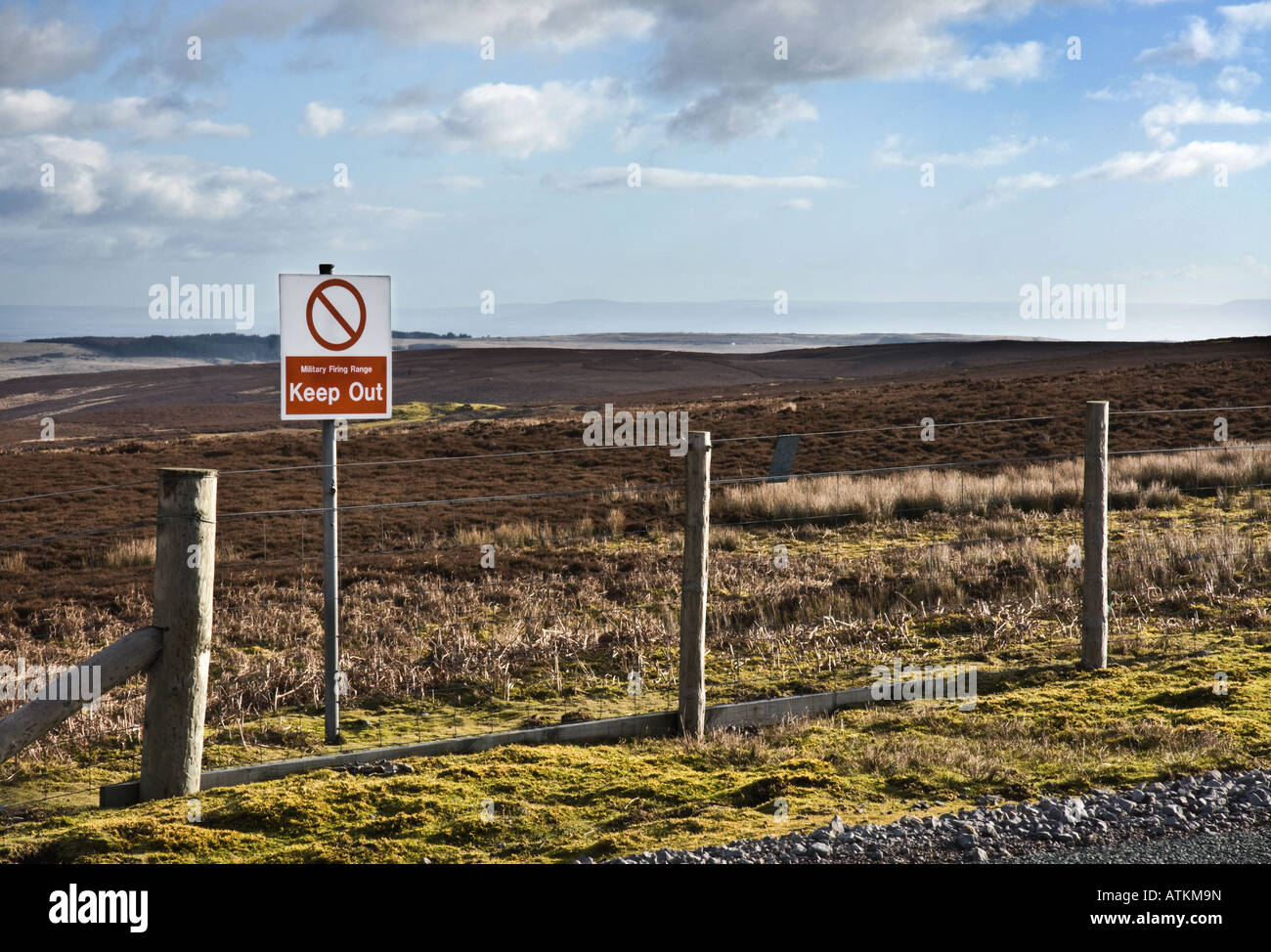 "Keep out" sign and fence on the edge of Army training land in ...